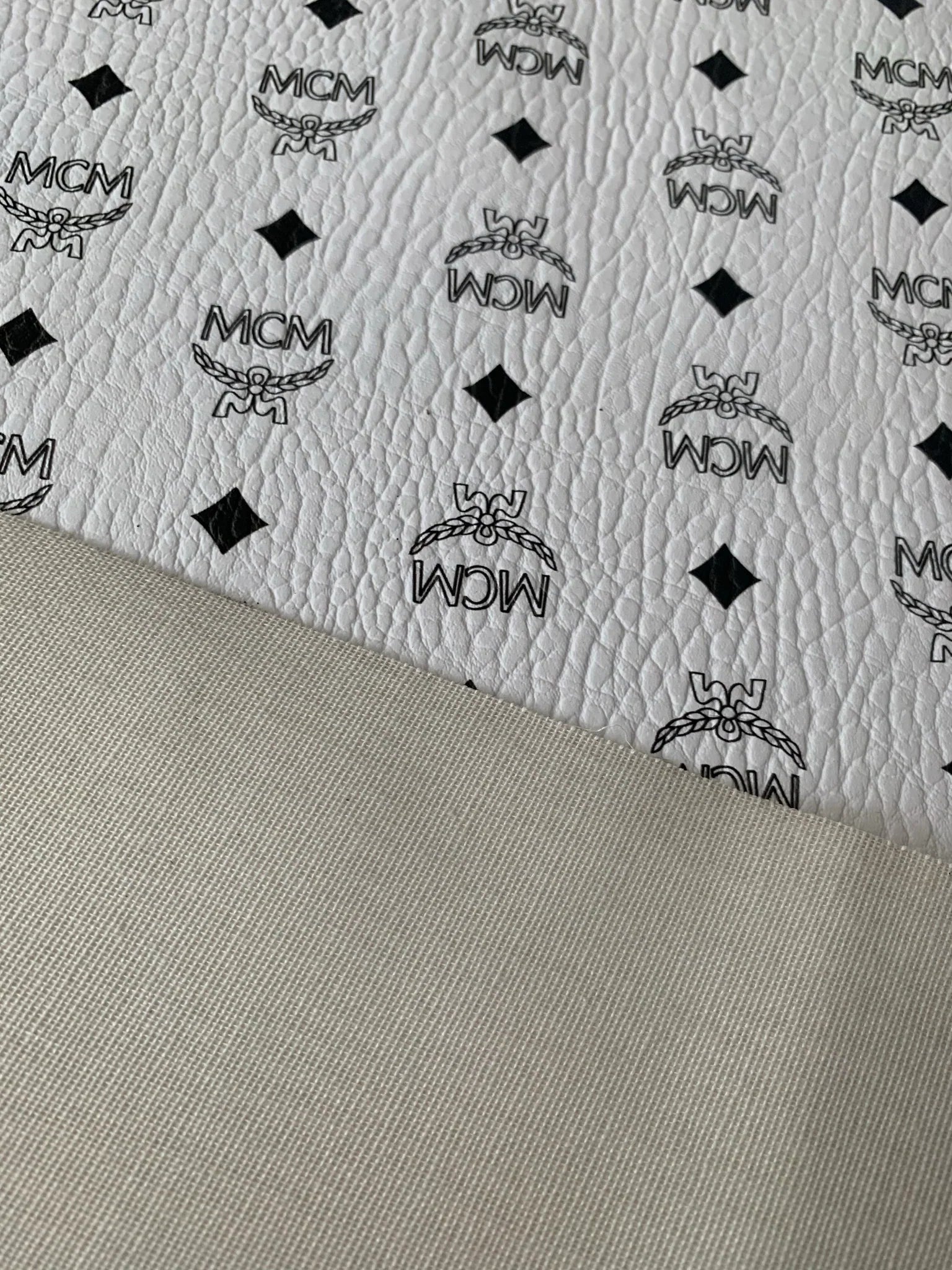White MCM Vinyl Leather for Custom Craft – Mono Fabrics | Premium Fabrics